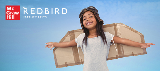Young girl with arms spread wearing cardboard airplane wings